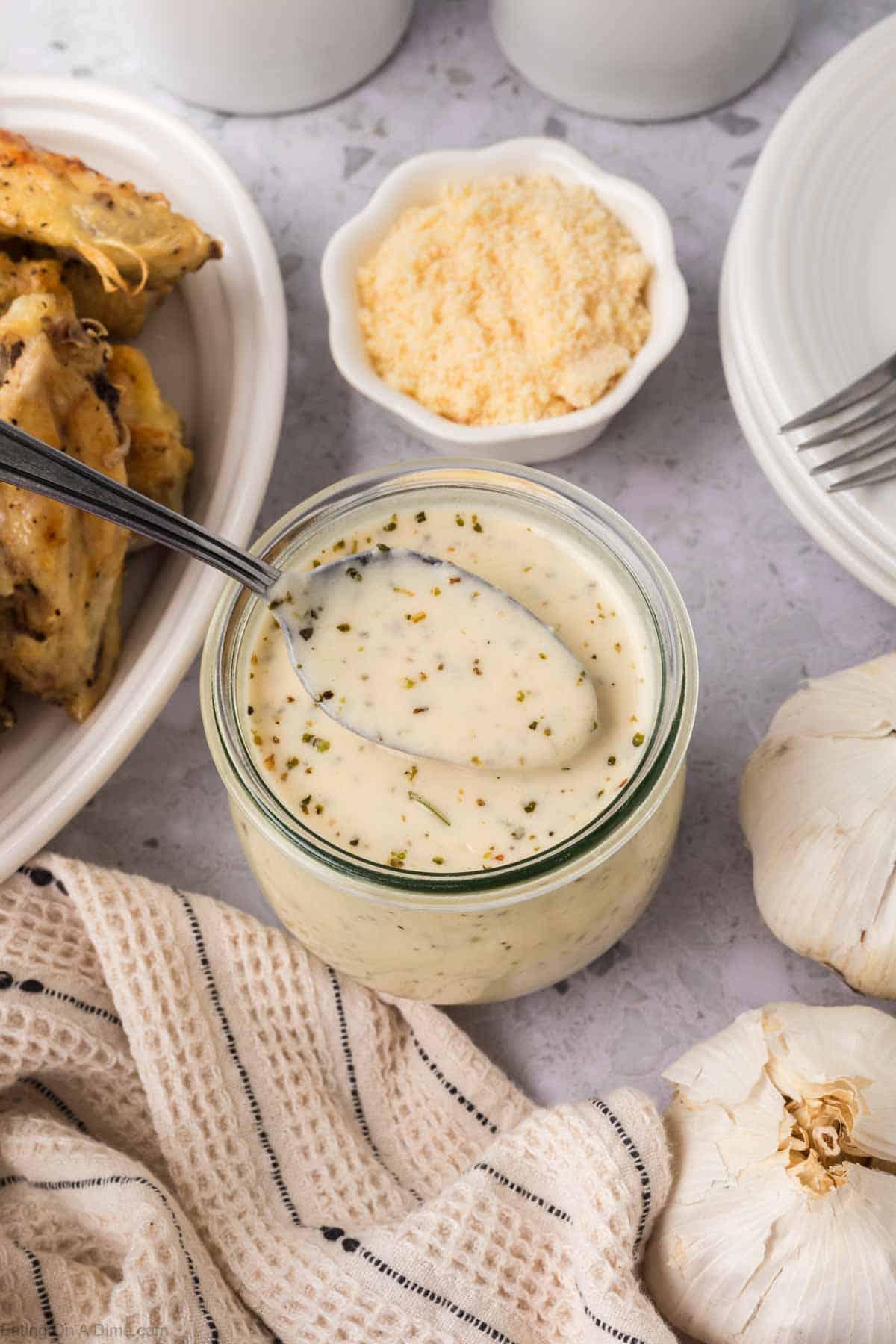 Garlic Parmesan Sauce: The Ultimate Flavor Boost - Eating on a Dime